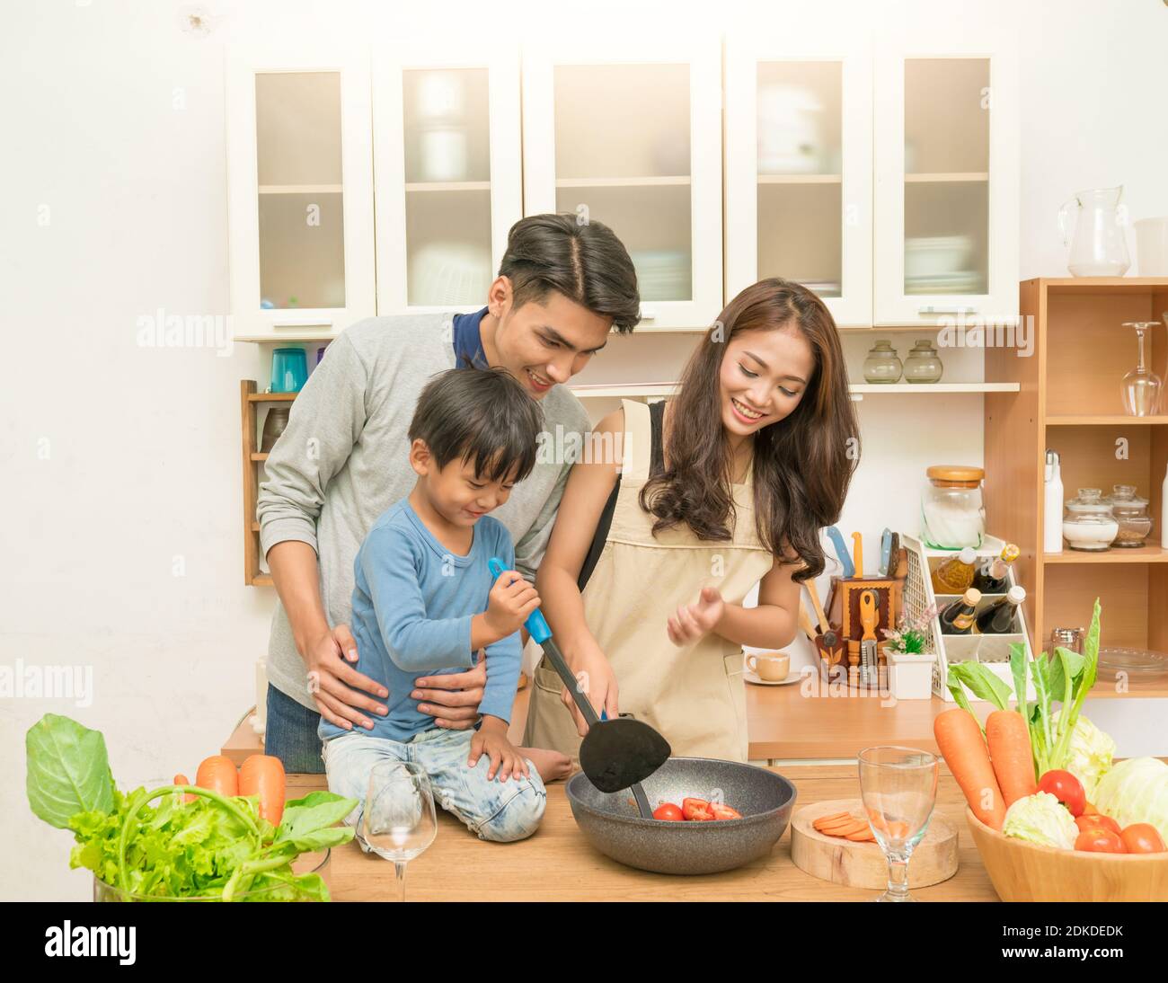 Indian couple cooking kitchen hi-res stock photography and images - Alamy