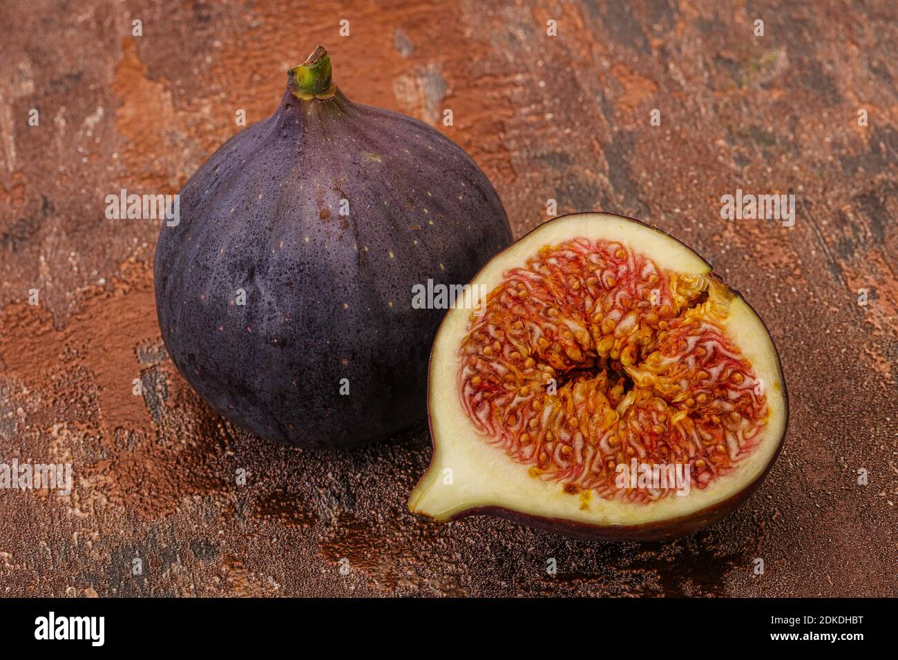 Sweet purple slice of fig fruit Stock Photo - Alamy