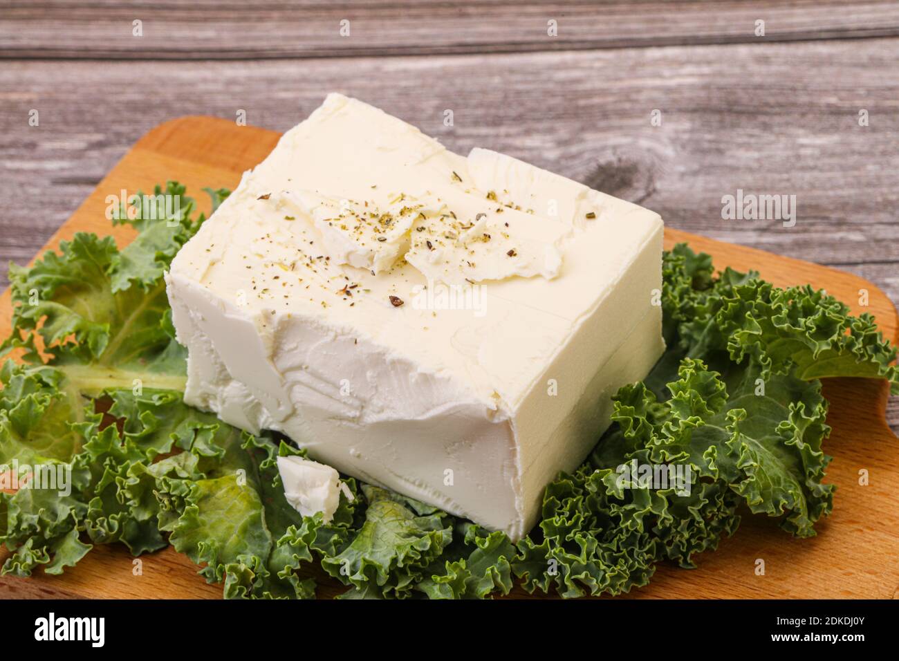Traditional tasty Greek Feta soft cheese brick Stock Photo - Alamy