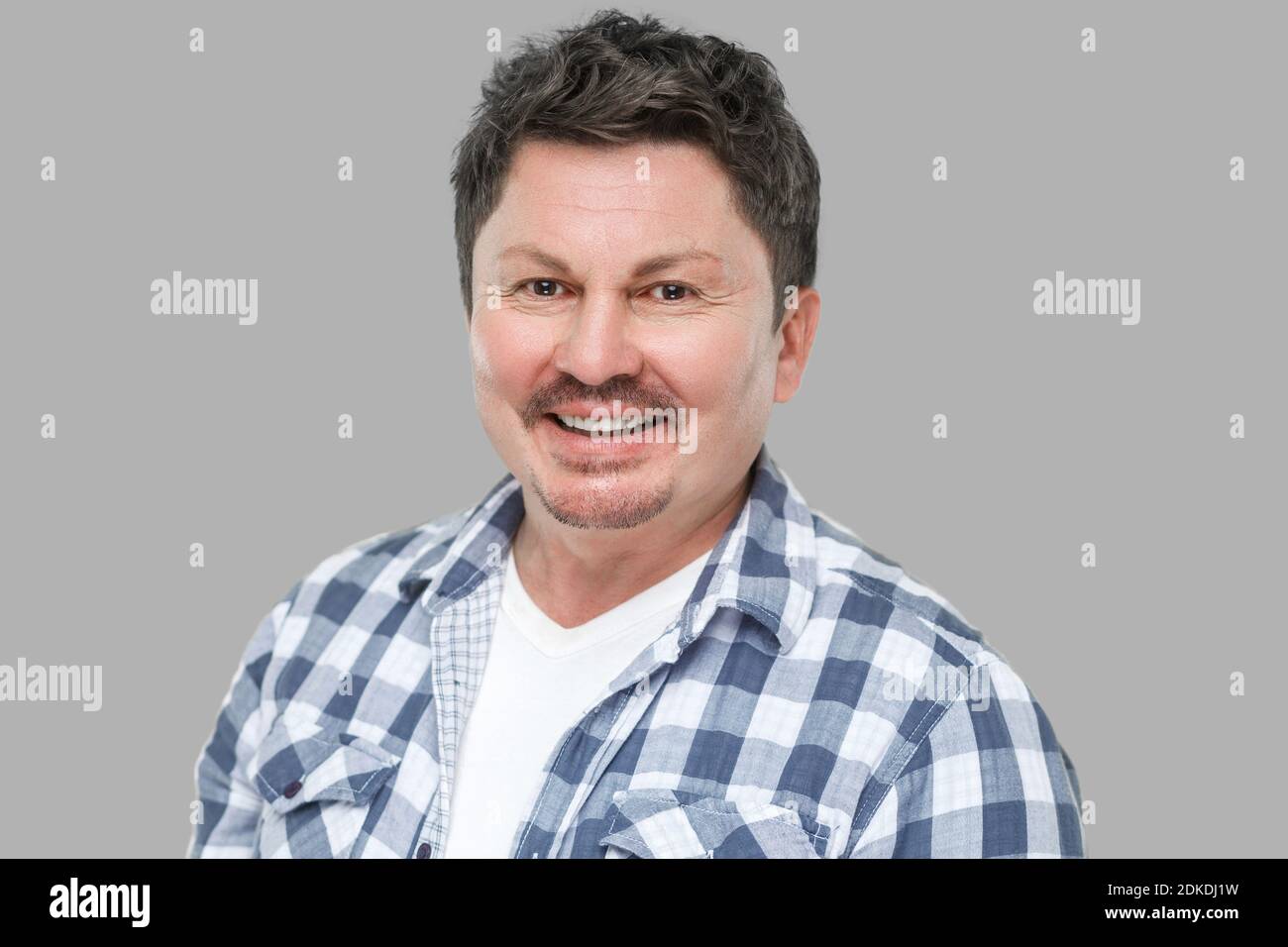 Portrait of happy successful handsome middle aged business man in ...