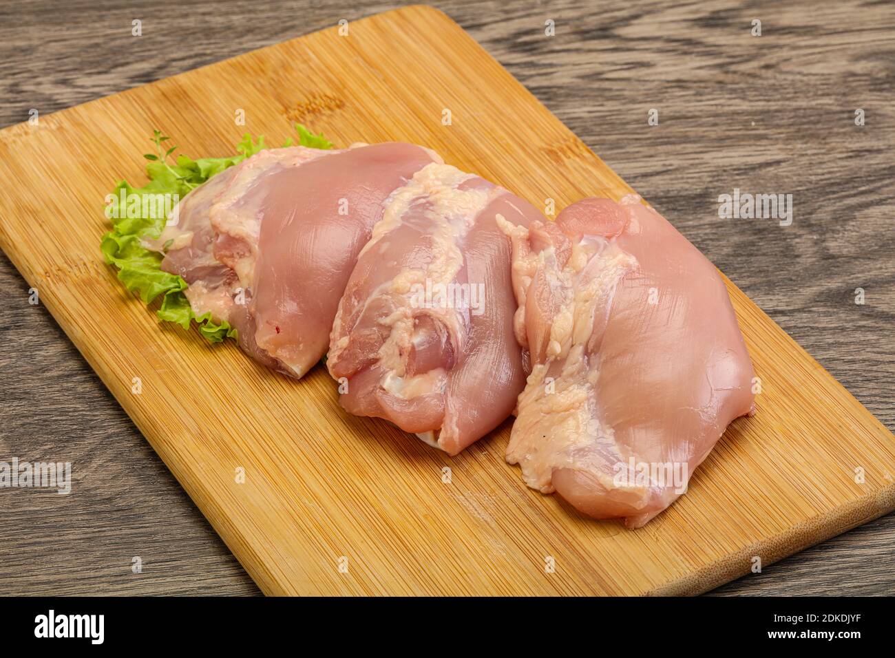 Raw chicken boneless and skinless leg for cooking Stock Photo - Alamy