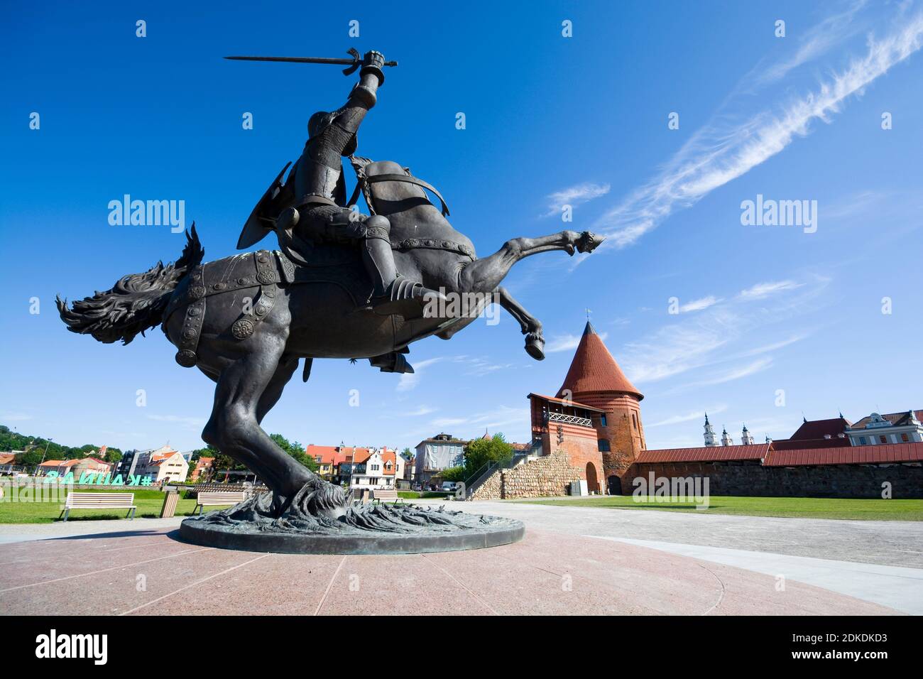 Knight statue by red brick medieval Kaunas castle, Lithuania Stock ...