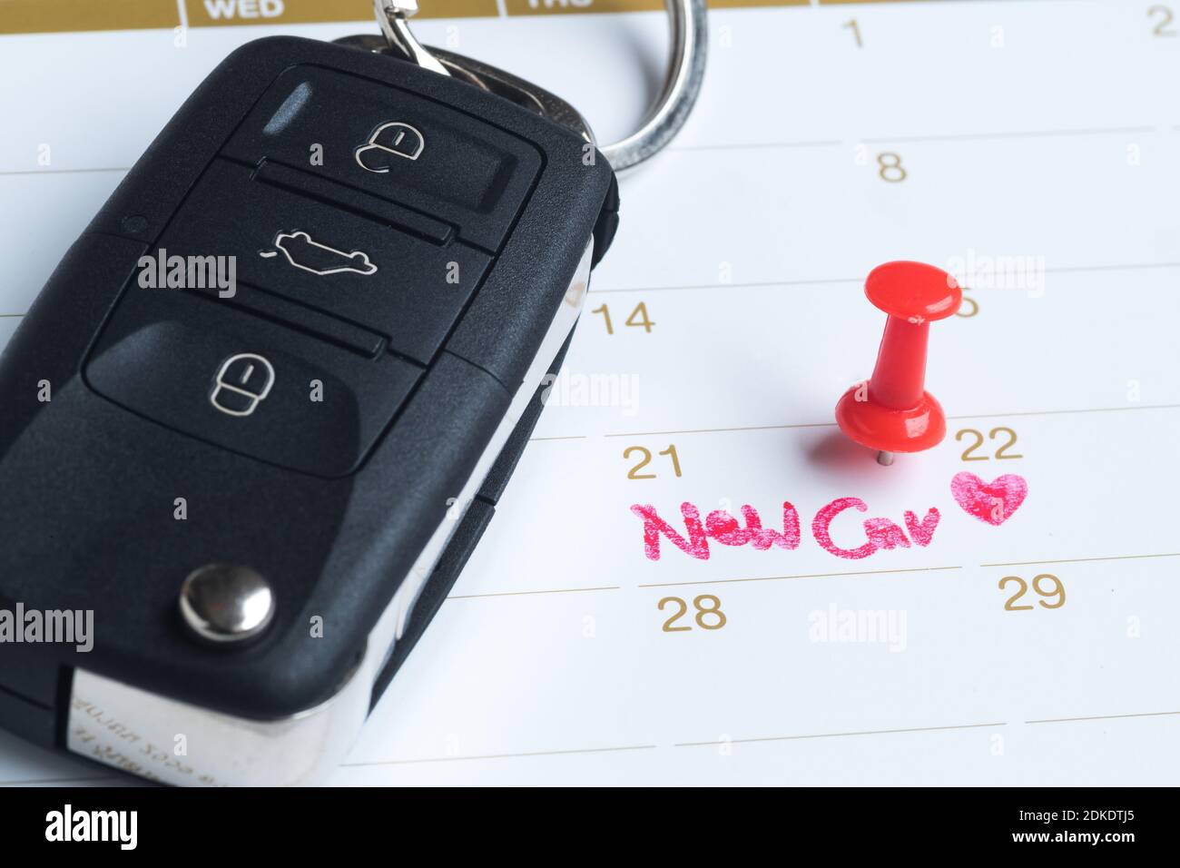 new car day plan marked with red push in on calendar Stock Photo - Alamy