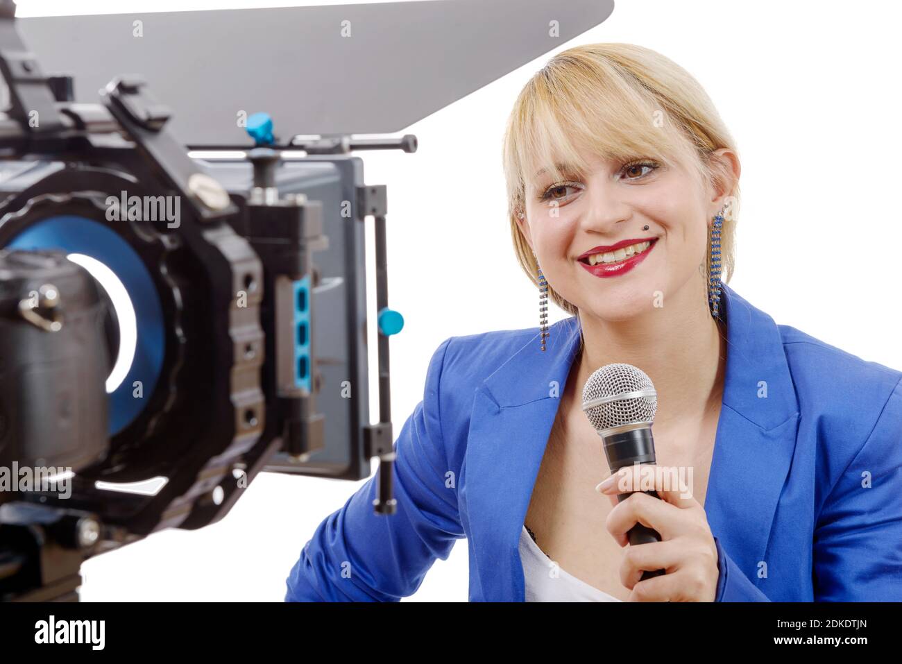 Looking at camera sitting smiling journalist hi-res stock photography ...