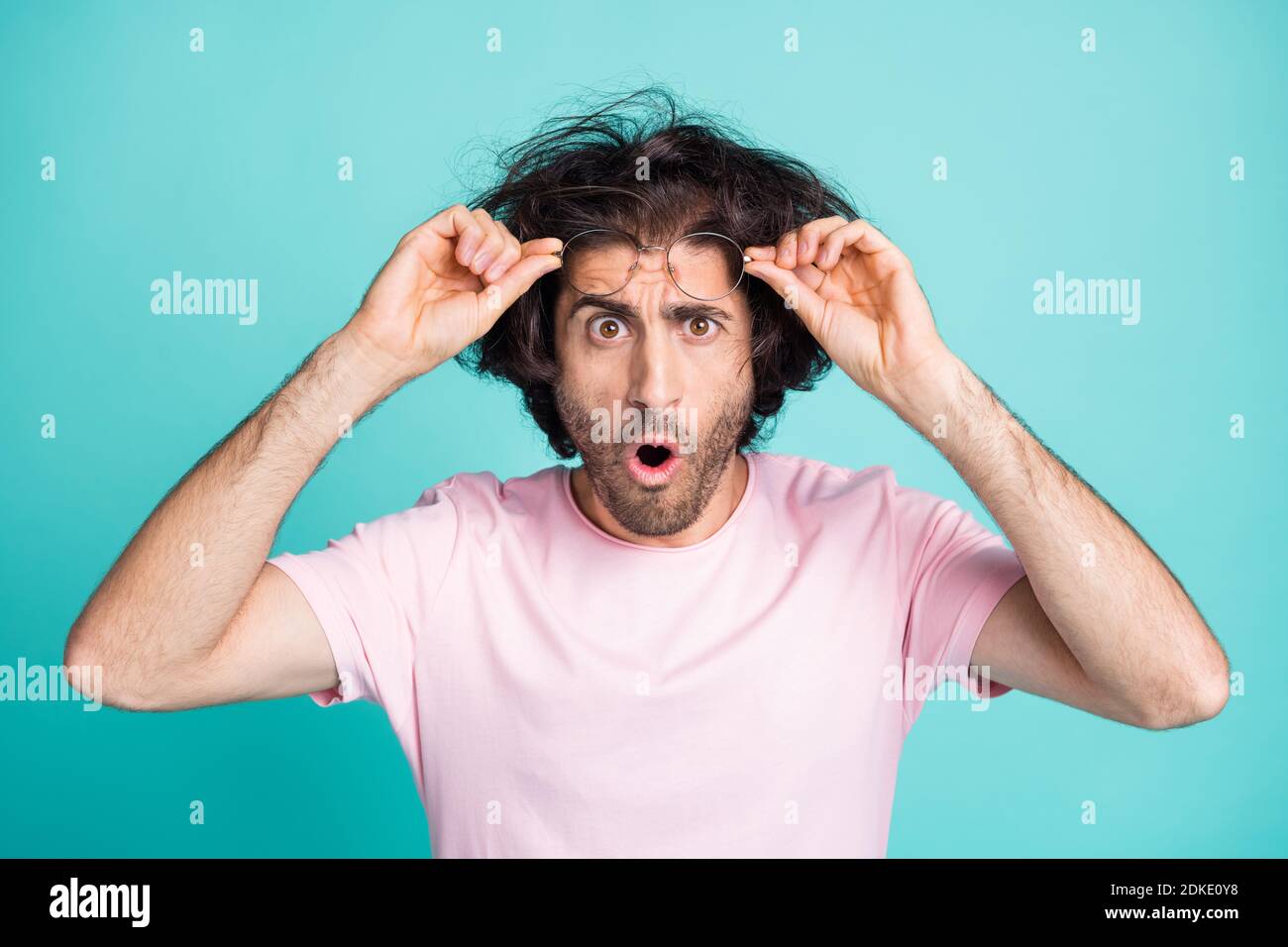 Close up photo of scared person open mouth hold glasses on forehead ...