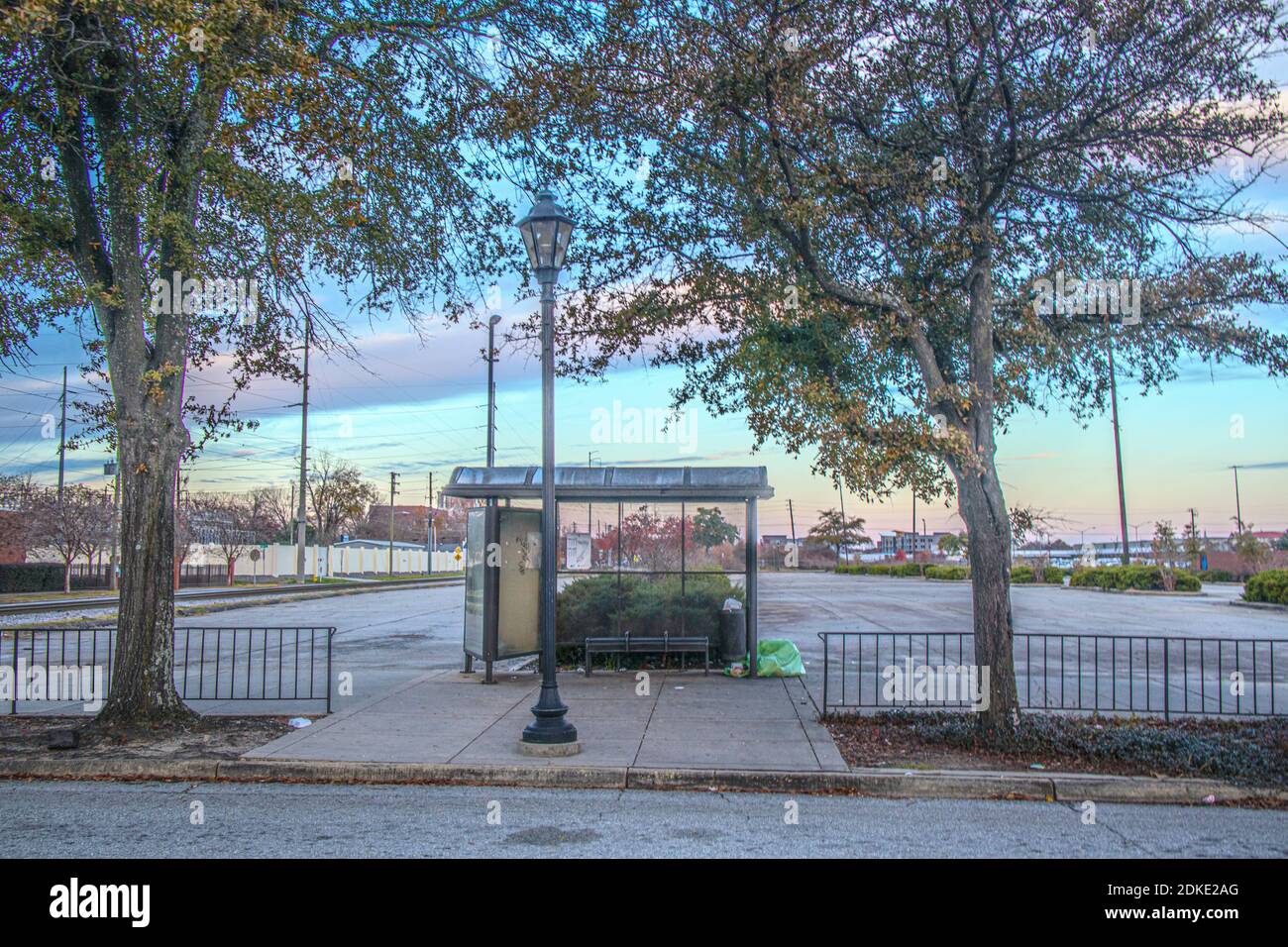 Augusta, Ga USA - 12 15 20: Piles of trash at a bus stop at the civic ...