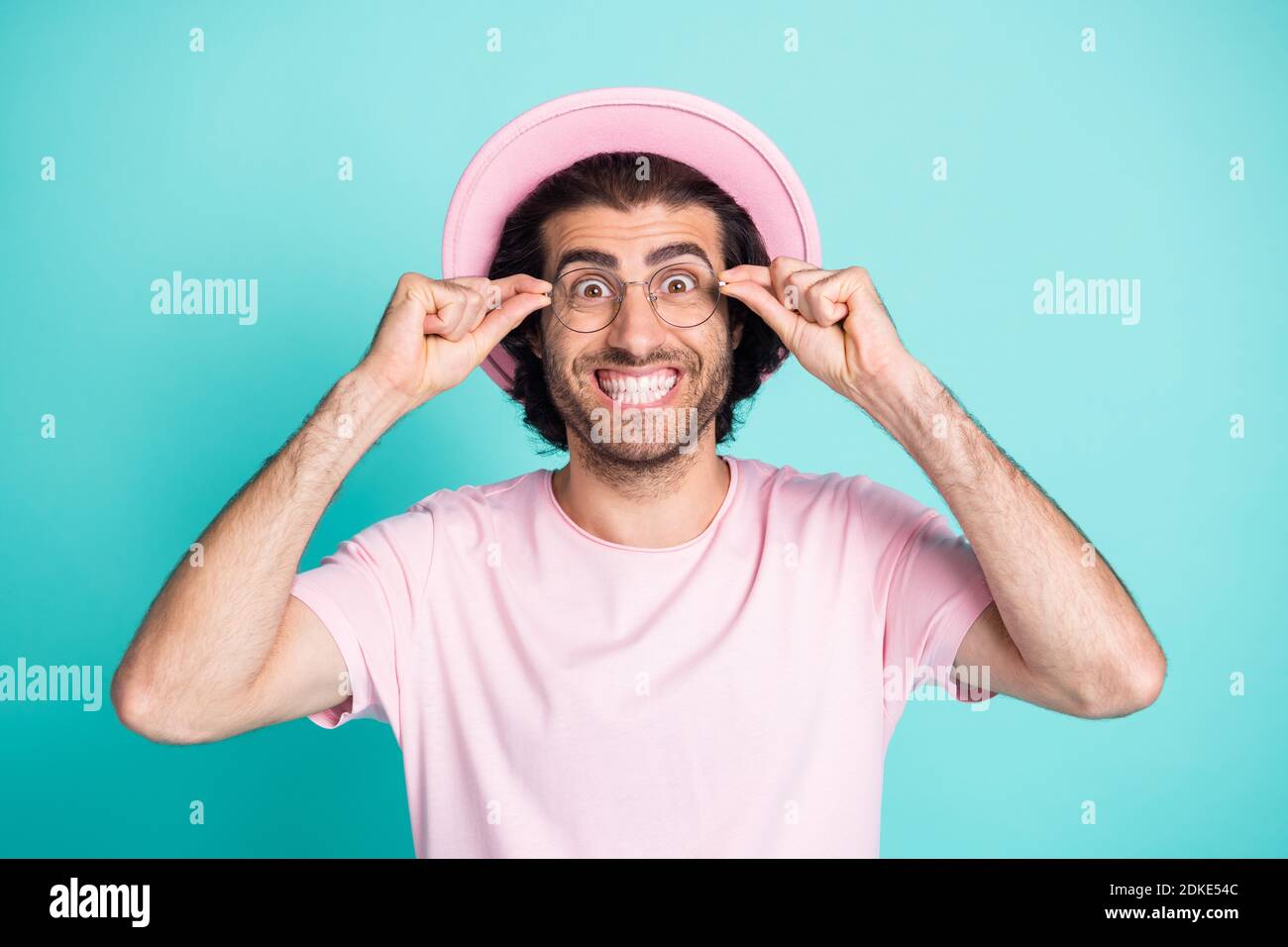 Photo portrait of crazy mad man staring grinning white teeth taking off ...