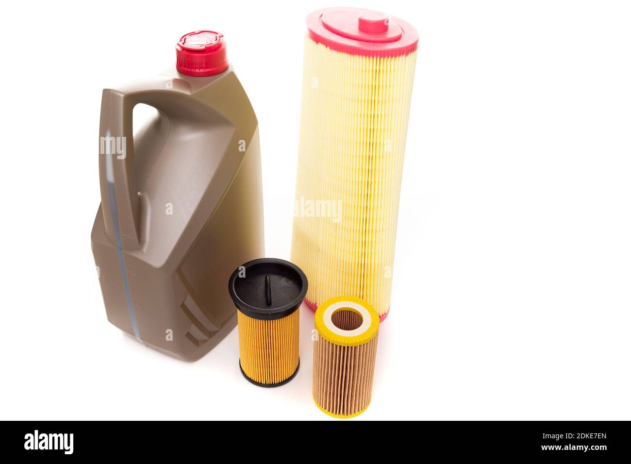 set of filters and oil for an internal combustion engine on a white ...