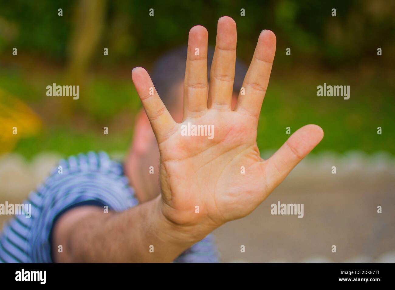 Man signaling stop hi-res stock photography and images - Alamy