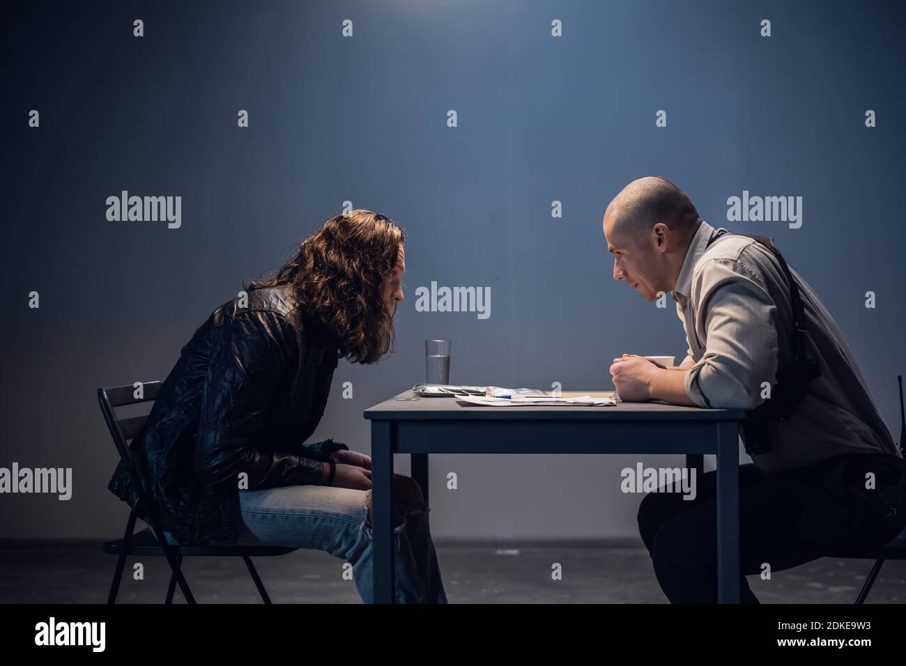 A police detective suspects a white man of committing a crime. Conducts ...