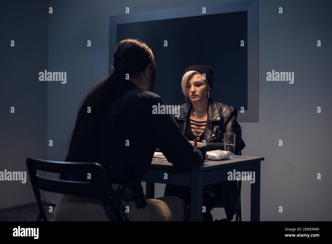 Woman interrogated security hi-res stock photography and images - Alamy