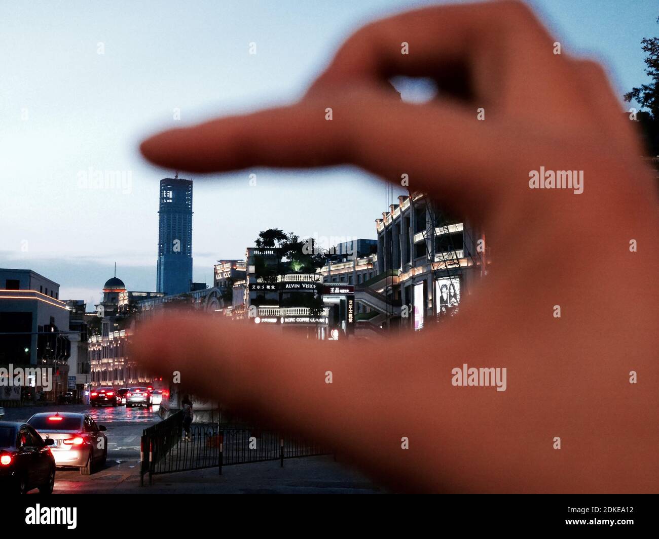 Hand holding building hi-res stock photography and images - Alamy