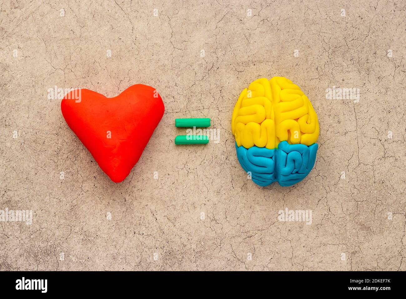 Think with love - heart and brain concept, top view Stock Photo - Alamy