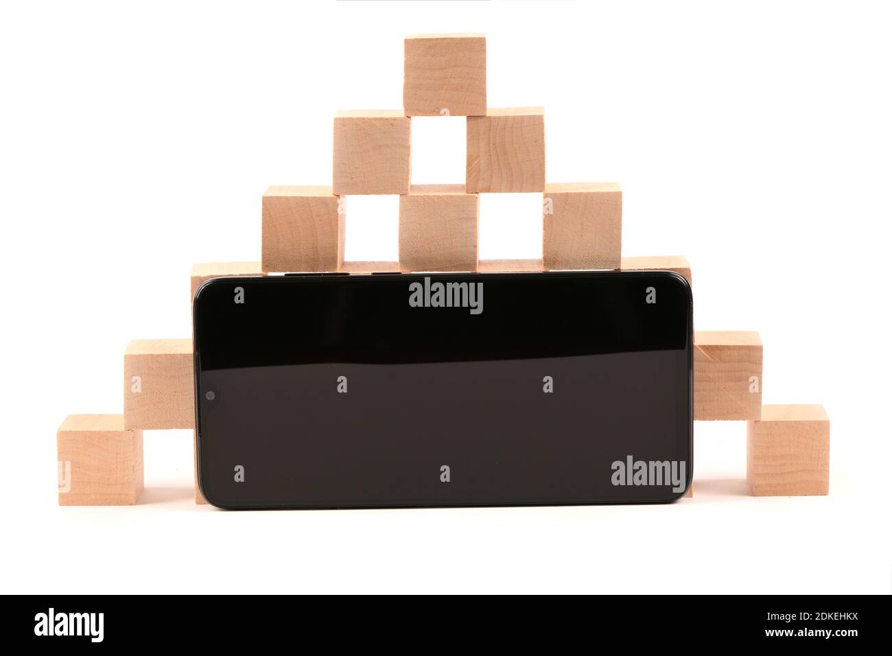 Black mobile smartphone and wooden cubes. Smartphone with blank screen ...