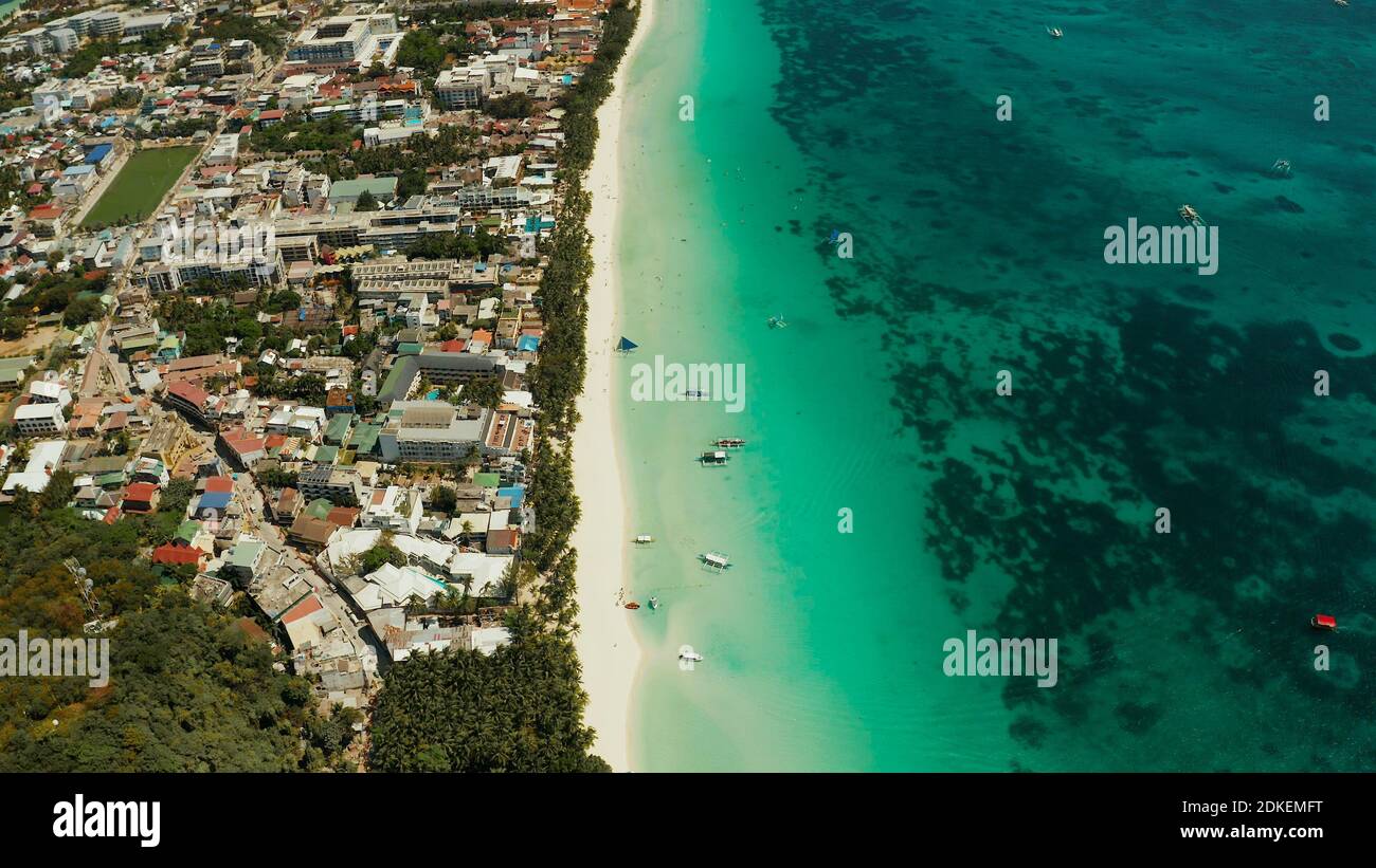 Tropical island Boracay with sandy beach and hotels view from the sea ...