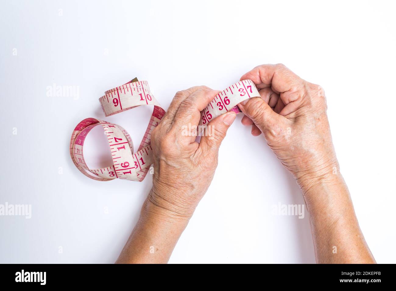 Woman holding ruler isolated on hi-res stock photography and images - Alamy