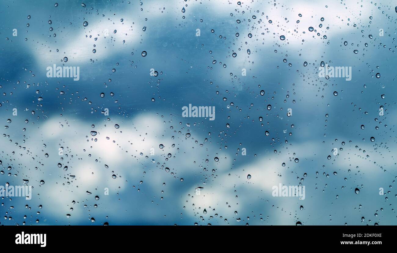 Water drops on glass, on sky background, background or texture Stock ...
