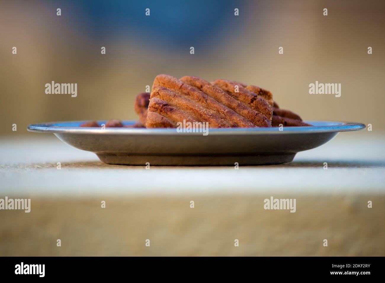 View of chocolate flavoured biscuits in a plate Stock Photo - Alamy