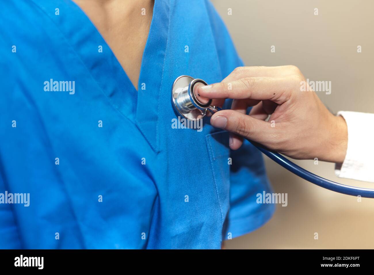 Doctor checking patients heart beat High Resolution Stock Photography ...