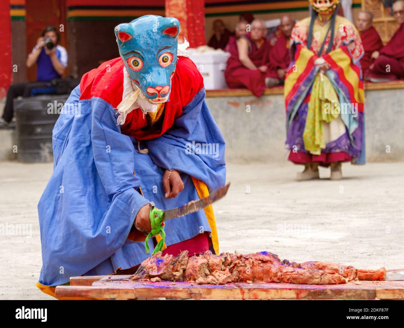 Lamayuru, India - June 17, 2012: Monk in mask performs sacrifice ritual ...