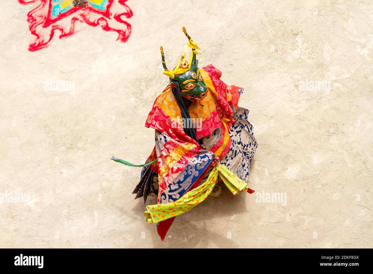 Unidentified monk in a bull deity mask with ritual dagger (phurpa ...