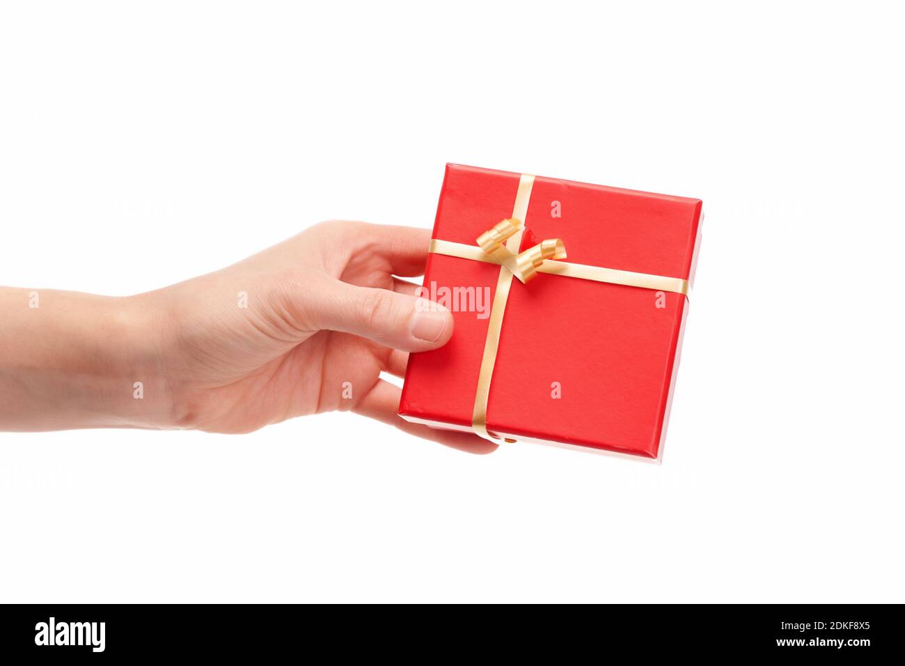 Hand handing over a gift on white background, copy space Stock Photo ...