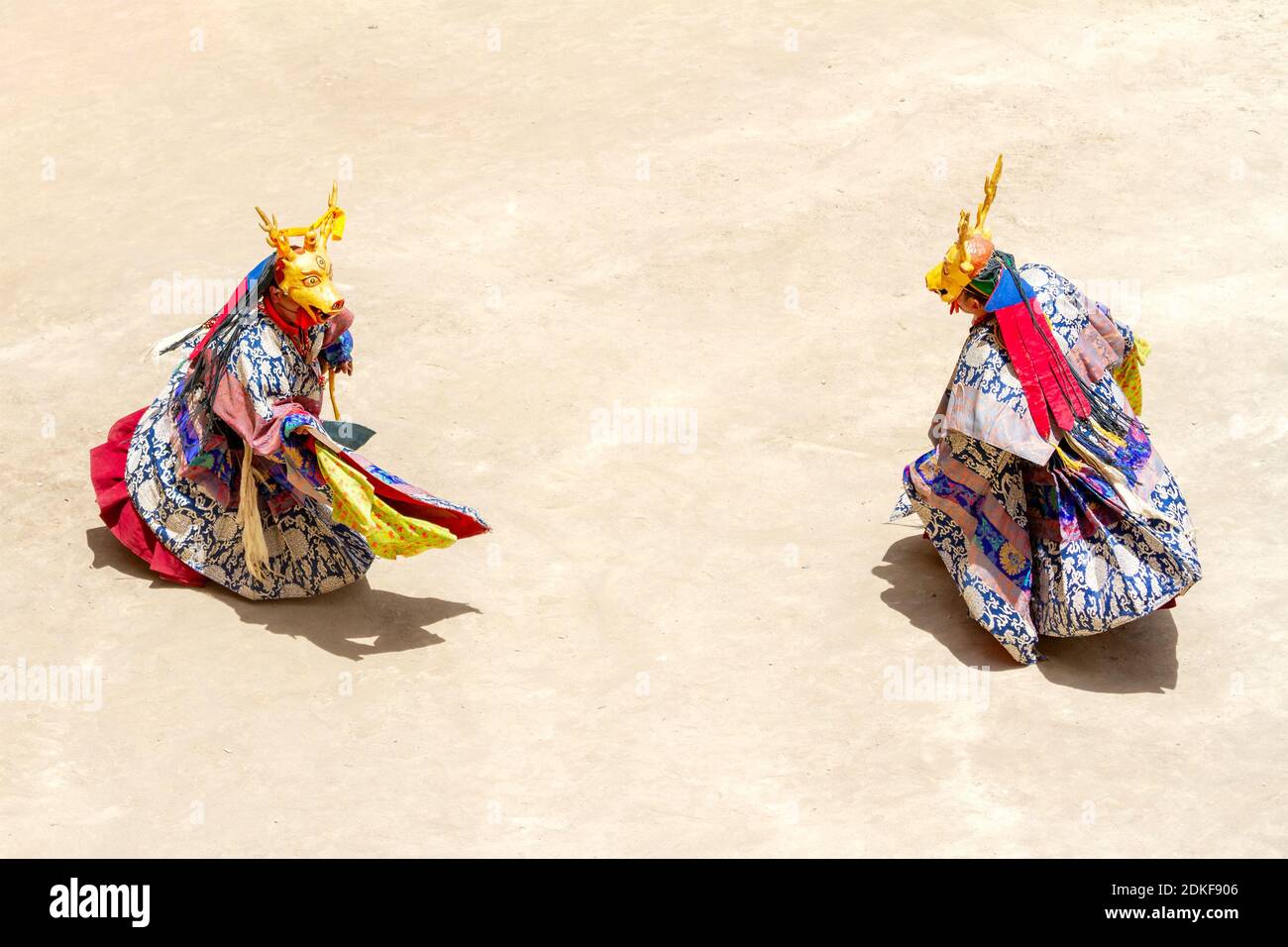 Two unidentified monks in deer mask perform a religious masked and ...