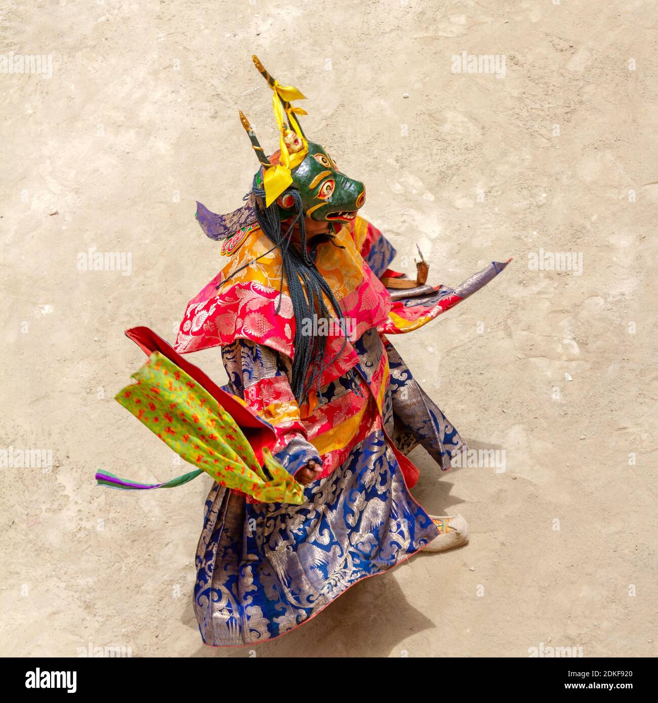 Unidentified monk in a bull deity mask with ritual dagger (phurpa ...