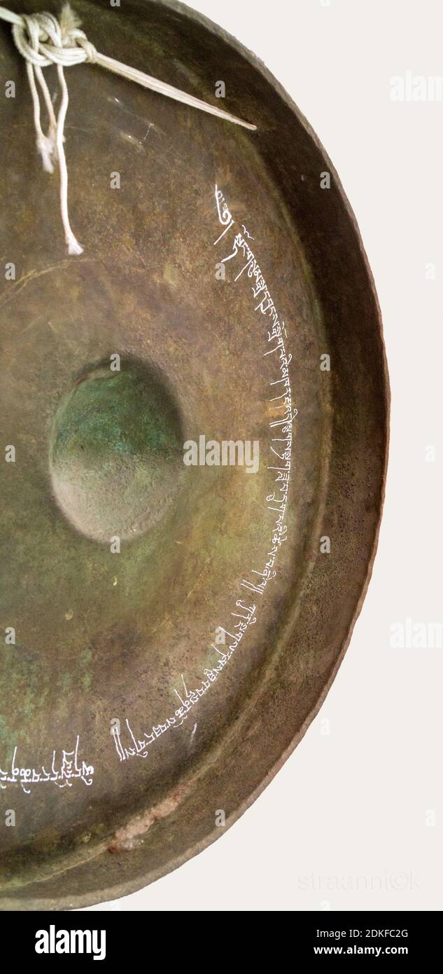 Antique gong with a sacred inscription in a Buddhist monastery ...