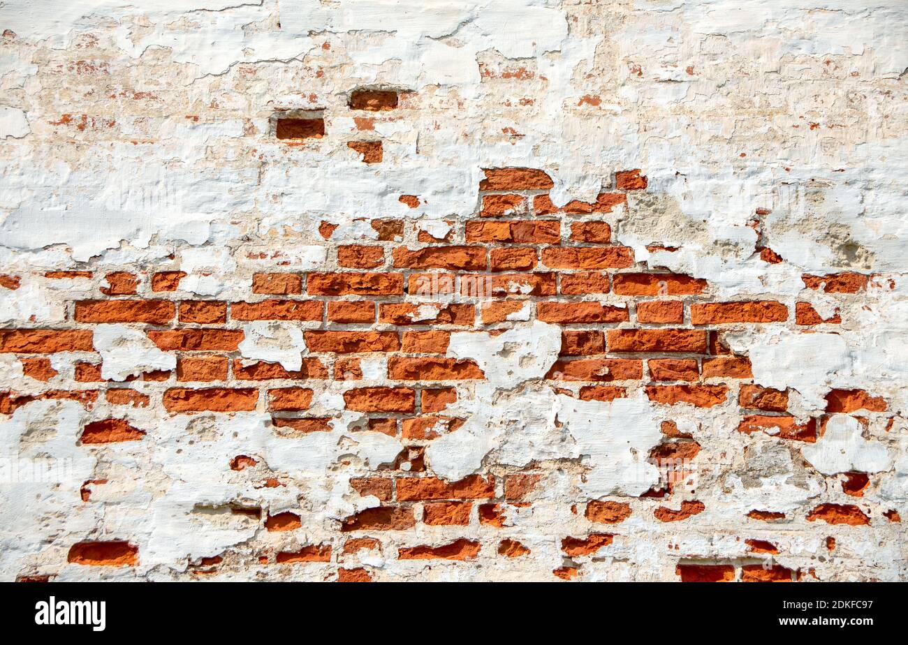 Close-up of a shabby ancient orthodox monastery brickwall made of red ...