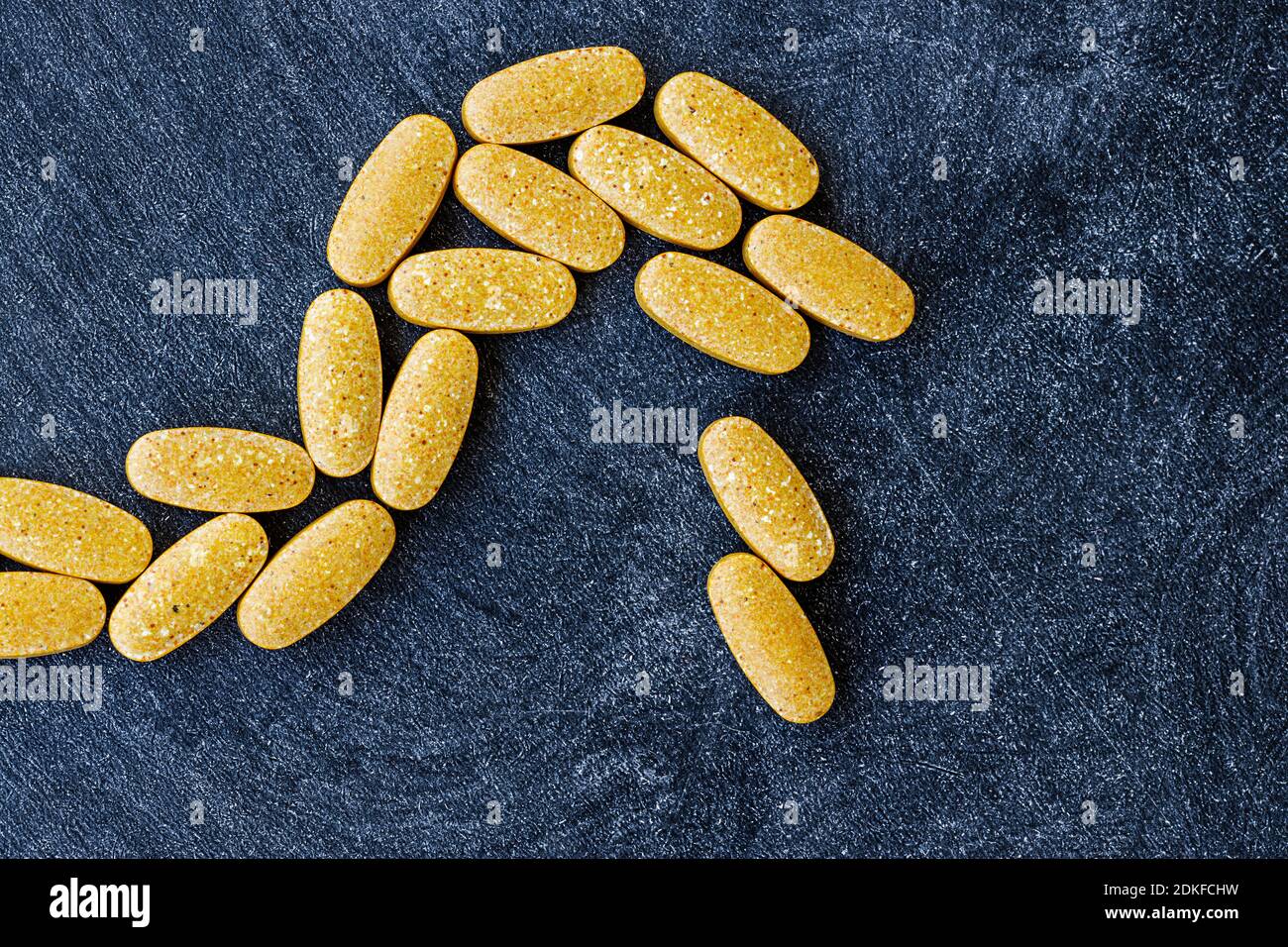 close-up of multivitamin and mineral supplement tablets. dietary ...