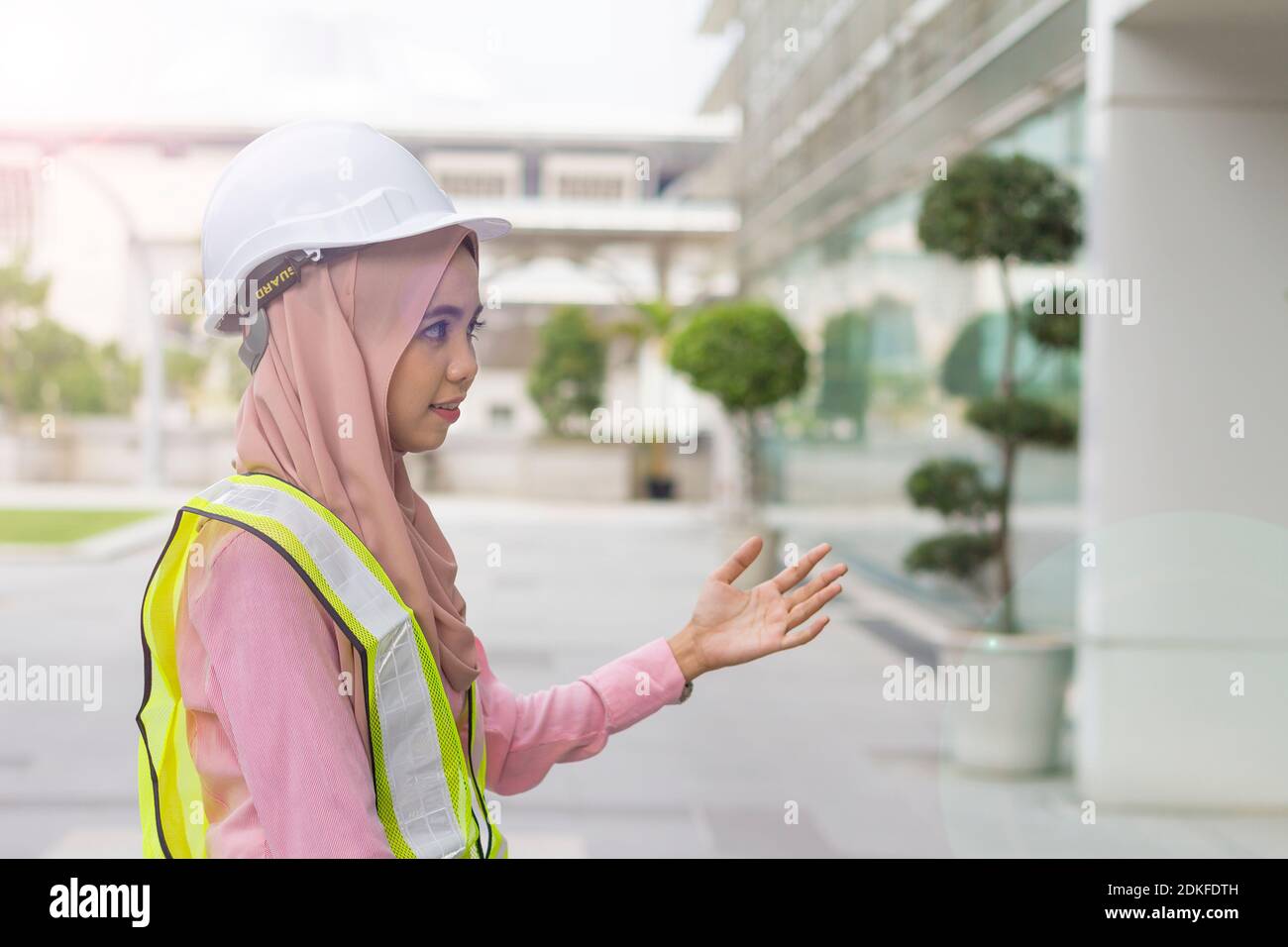 Construction worker check list hat hi-res stock photography and images ...
