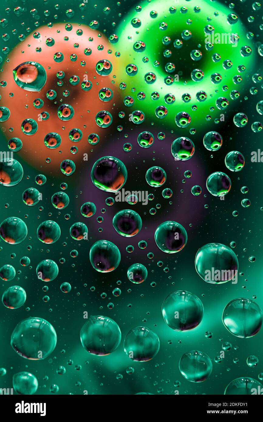 abstract selective focus colorful background with water drops. water ...