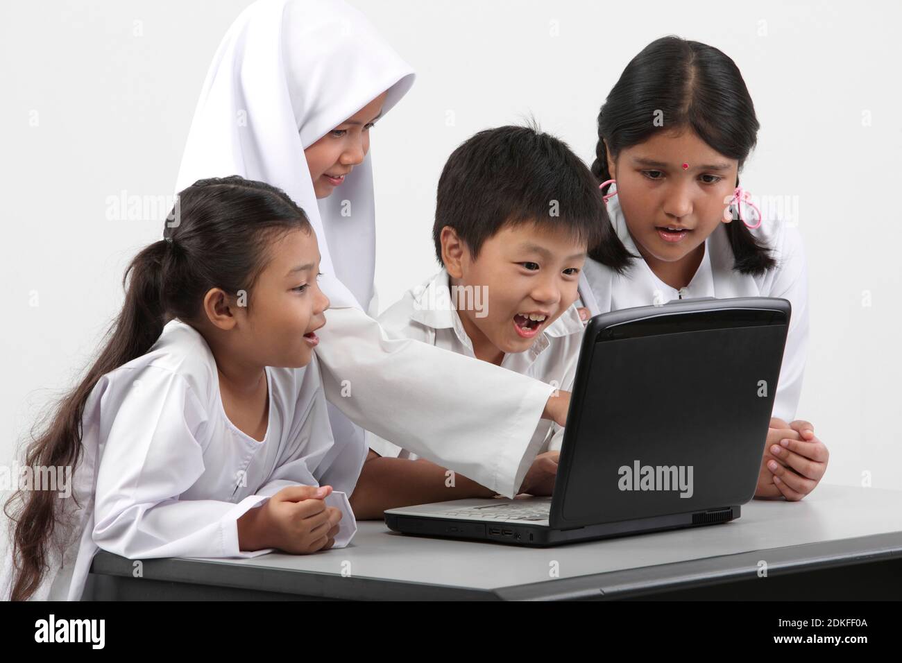 Computer notebook indian kid hi-res stock photography and images - Alamy
