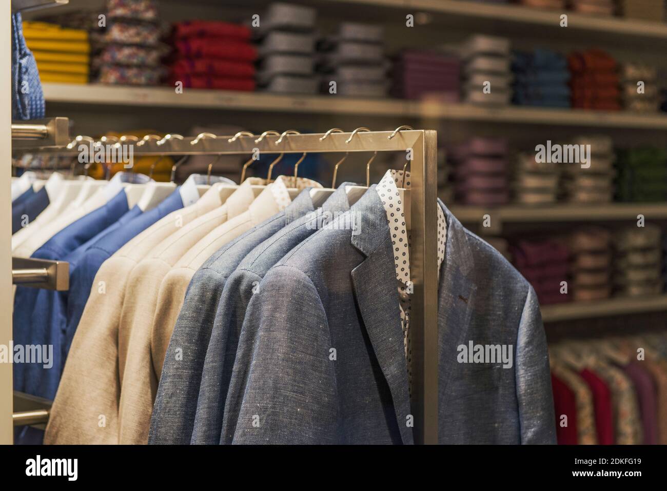 men clothing on hanger in a shop - shopping in mall concept Stock Photo ...