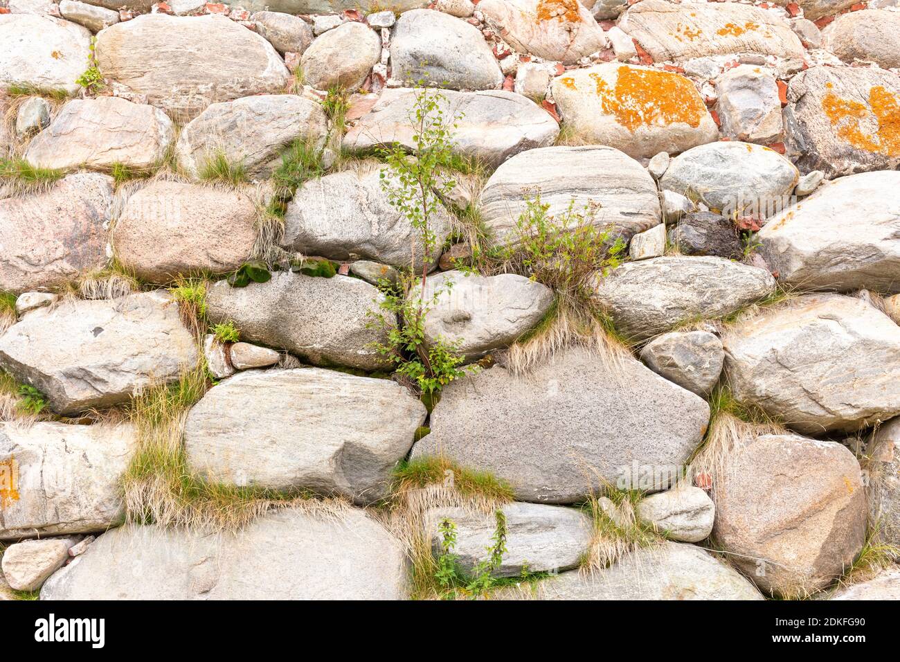 Close-up of an ancient orthodox monastery stone wall made of large ...