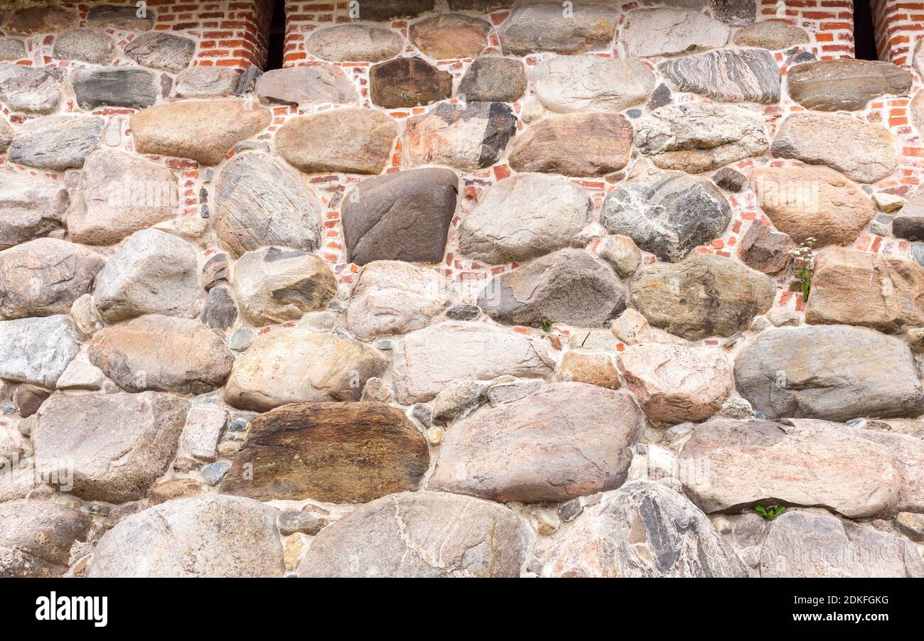 Close-up of an ancient orthodox monastery stone wall made of large ...