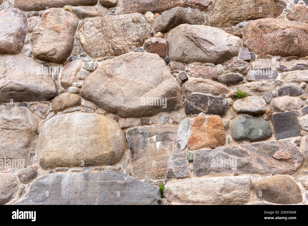 Close-up of an ancient orthodox monastery stone wall made of large ...