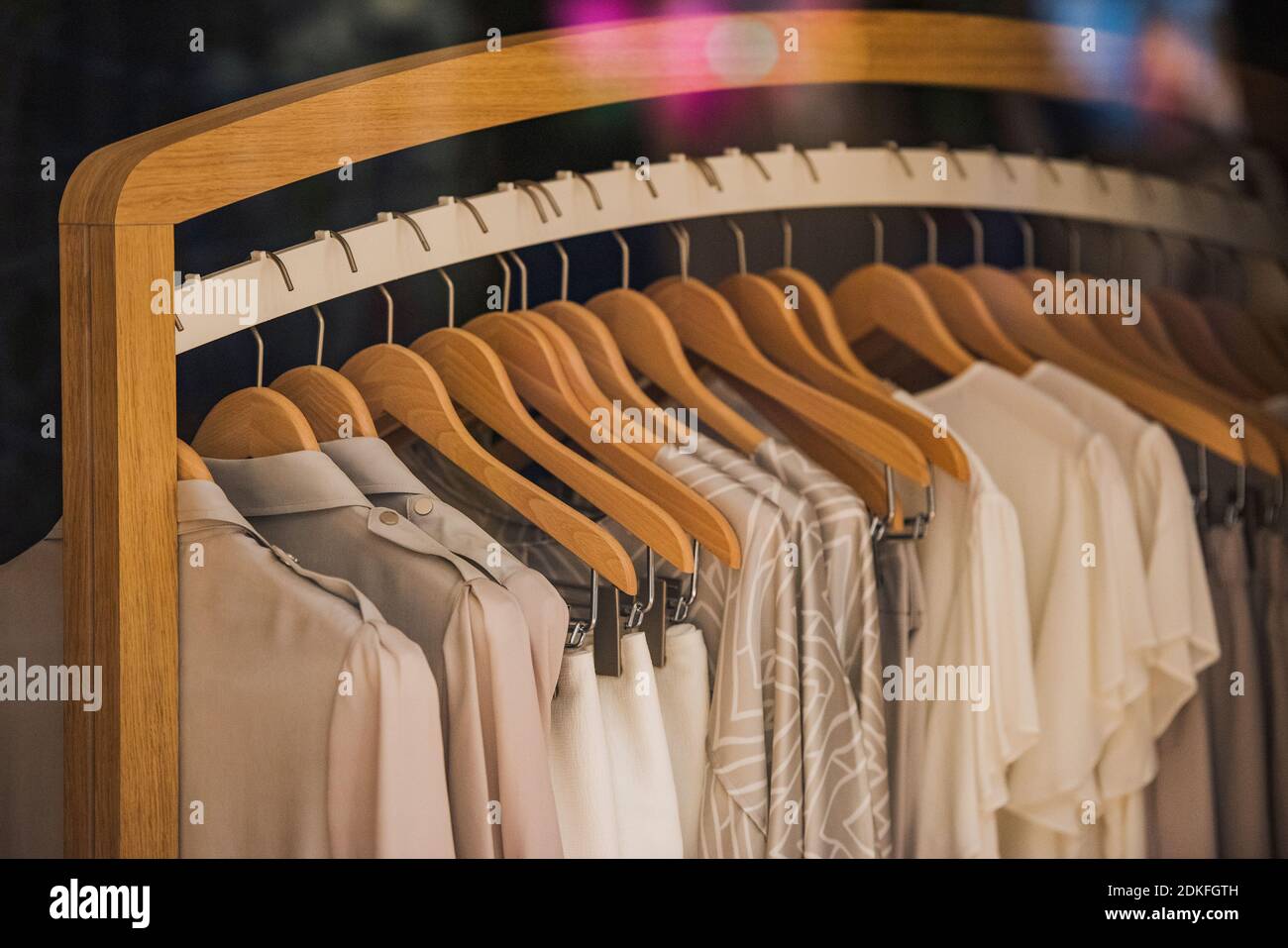 Women clothing on hangers in a mall - shopping in mall concept Stock ...