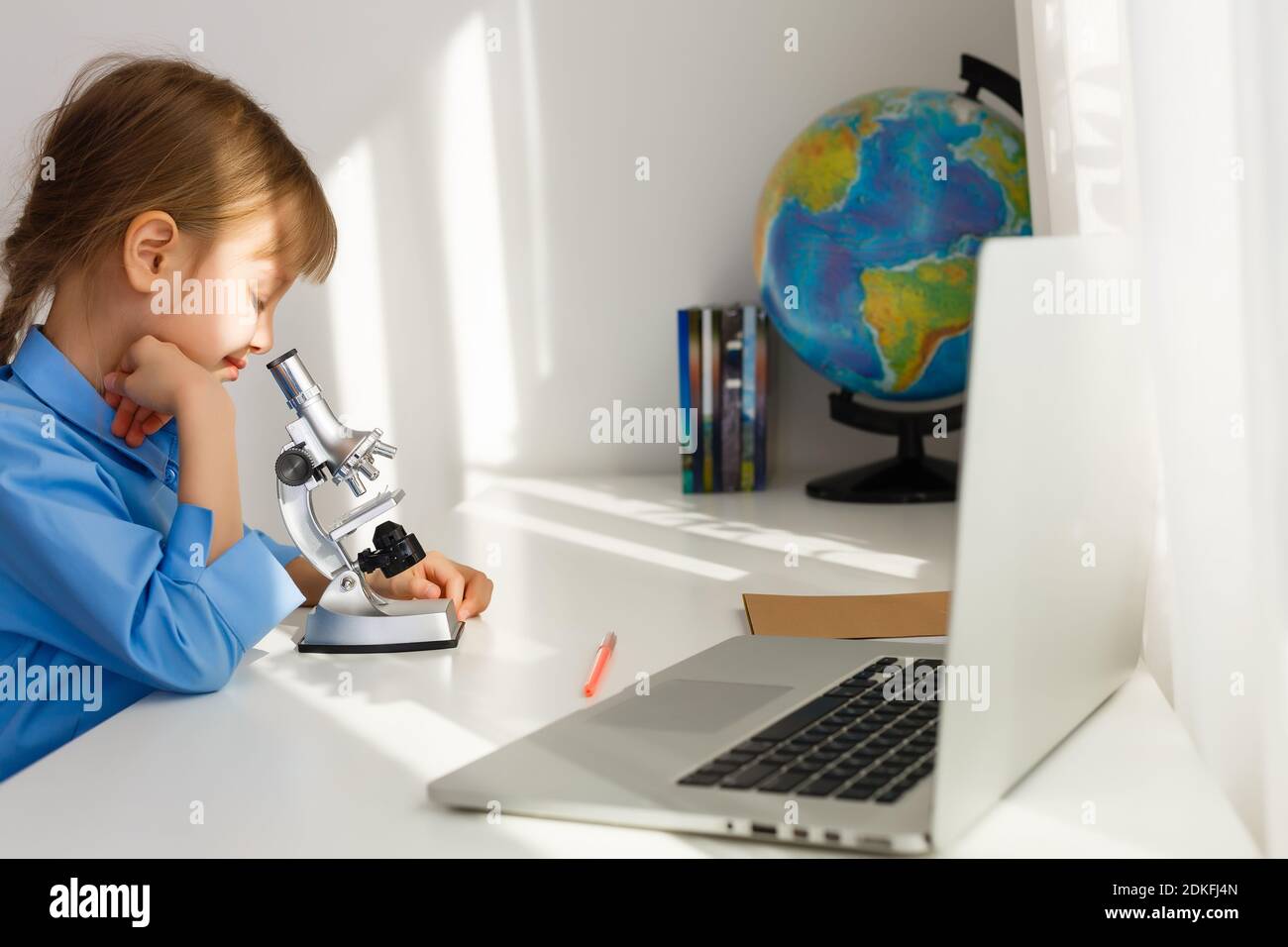 Remote lessons. The child smiles happily and gets knowledge remotely ...