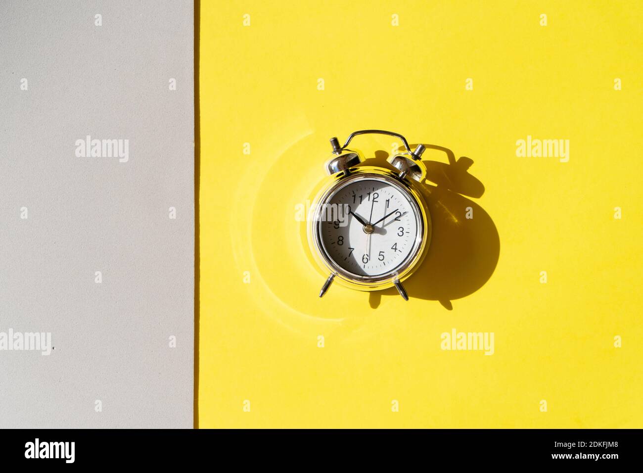 gray alarm clock Stock Photo - Alamy
