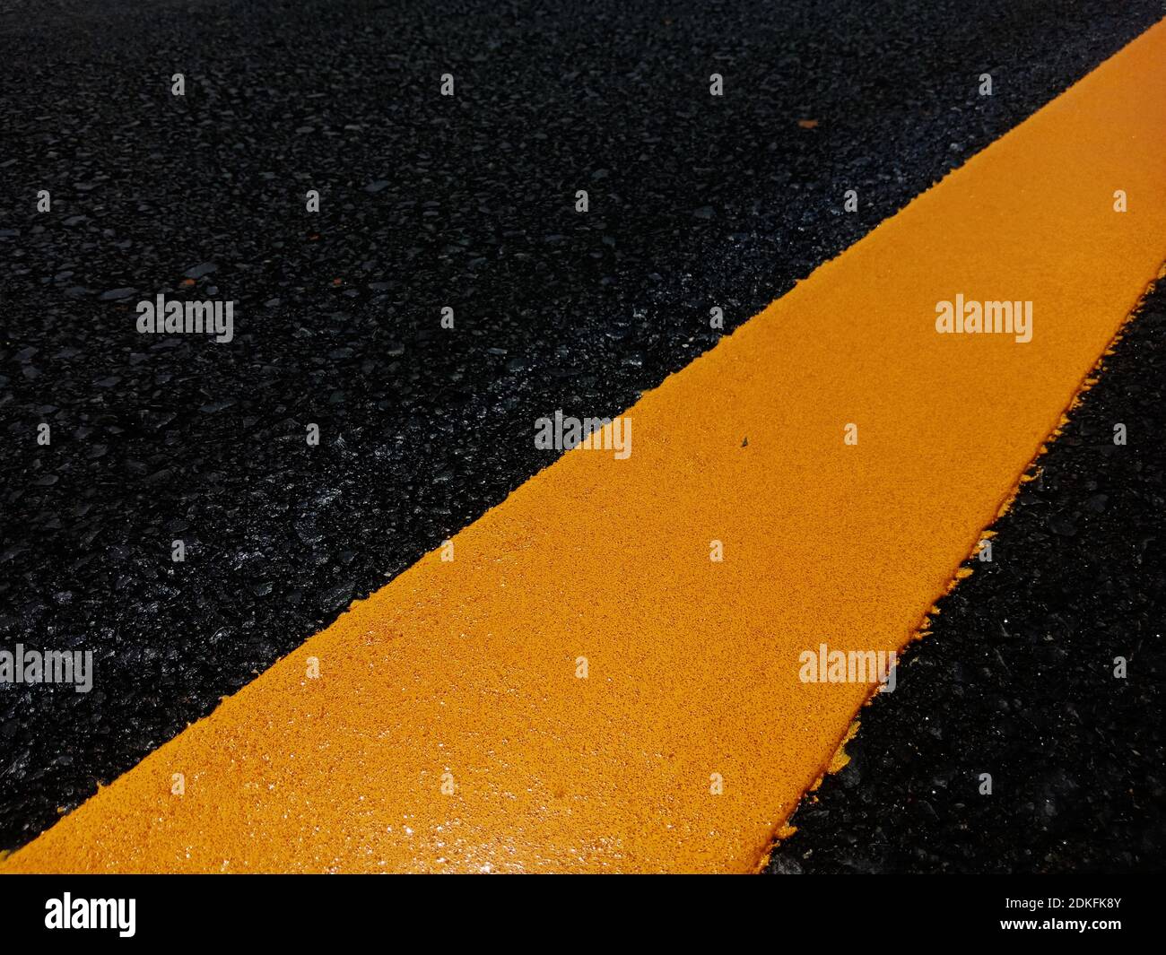 Thermoplastic road marking paint hi-res stock photography and images ...