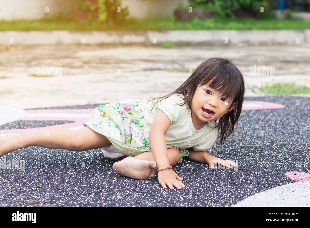 Injured girl on playground hi-res stock photography and images - Alamy