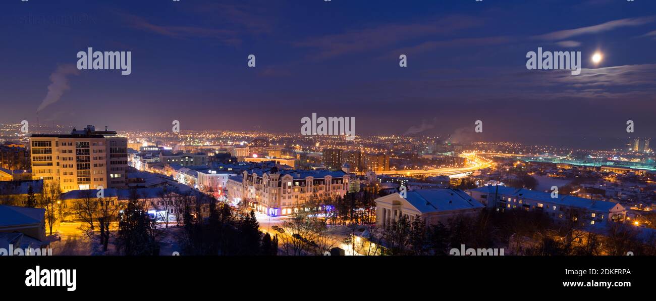 Night winter panorama of the Penza city in a full moon, with ...