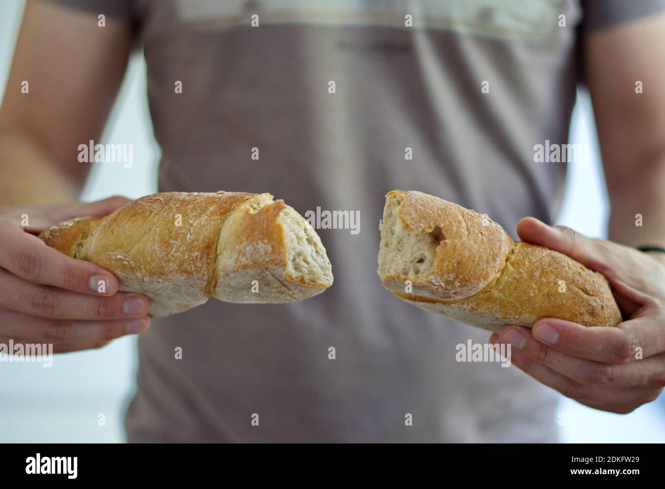 Breaking The Bread High Resolution Stock Photography and Images - Alamy