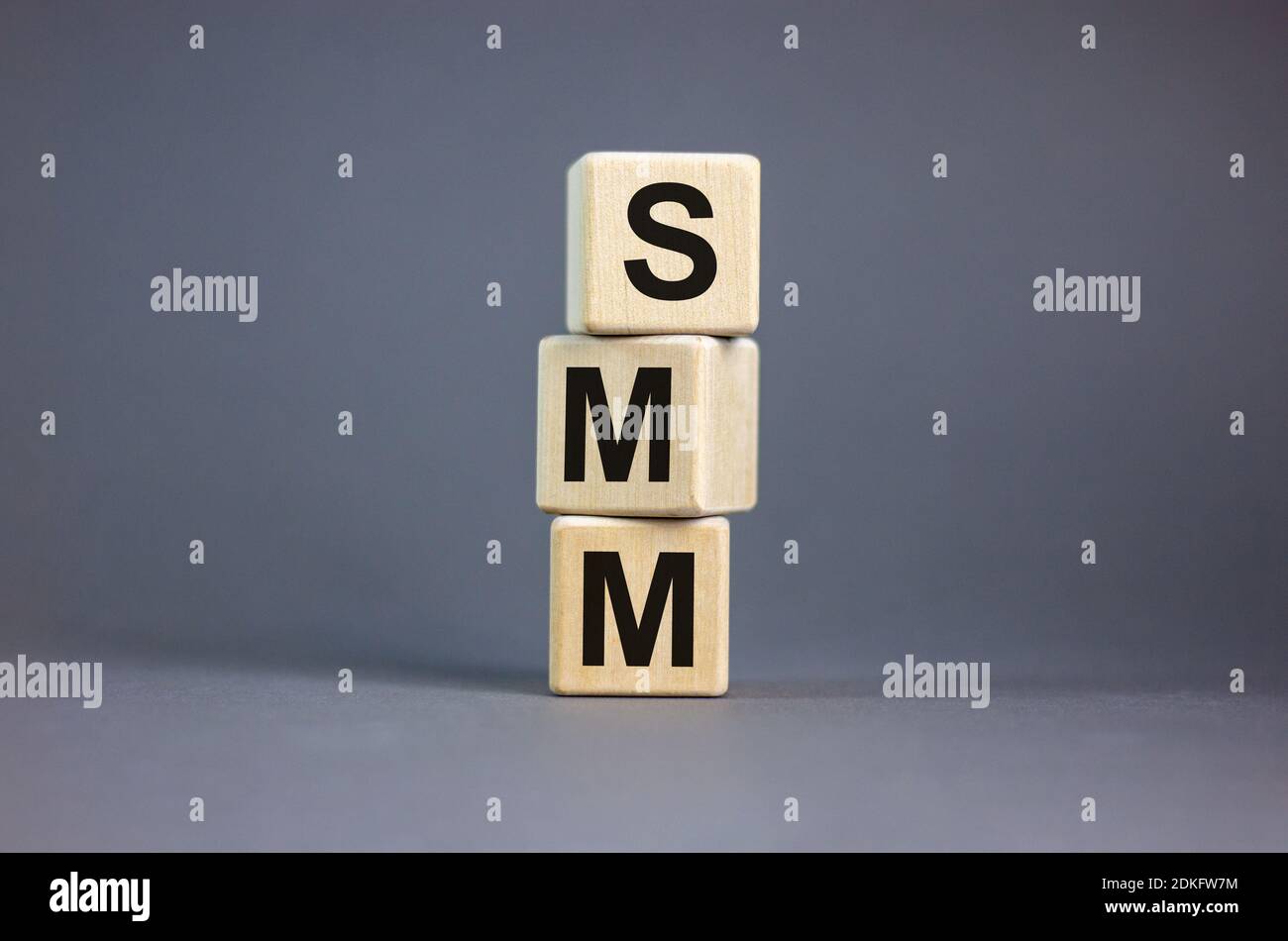 SMM symbol. Wooden cubes with word 'SMM - social media marketing' on ...