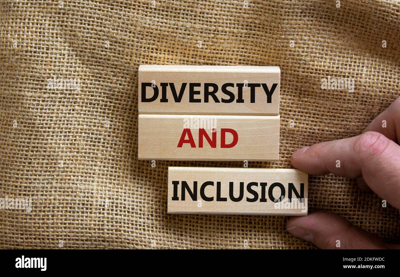 Diversity and inclusion symbol. Wooden blocks form with words ...