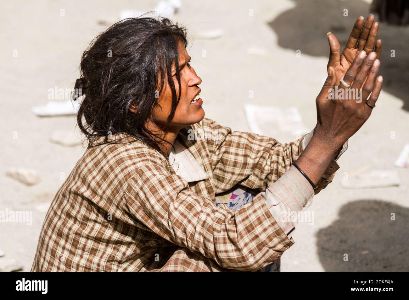 Hemis, India - June 29: homeless beggar women with outstretched arms ...