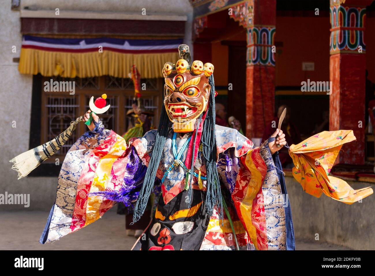 Buddhist monk in costume mask hi-res stock photography and images - Alamy