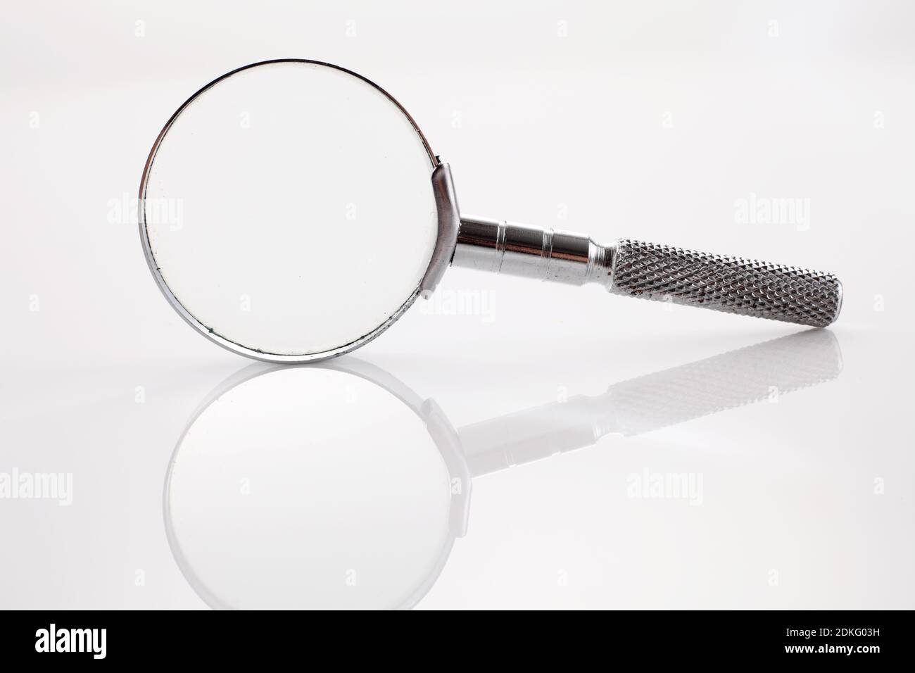 small magnifier glass on the white background Stock Photo - Alamy